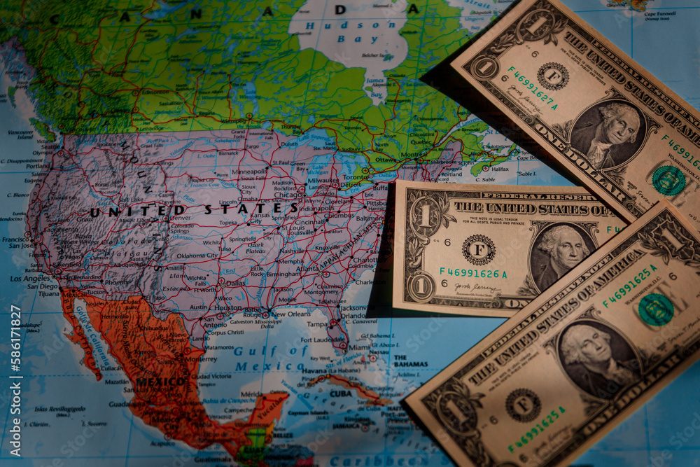 a map of the USA with one dollar notes arranged in an arrow pointing in ...