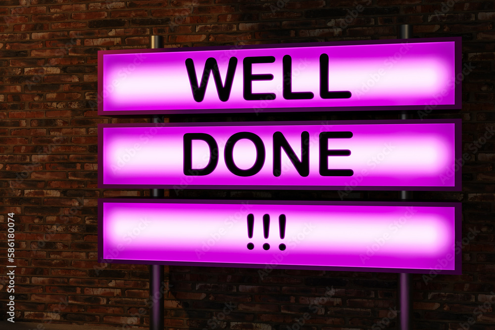 Well done. Black letters on a pink light box. Sign placed in front of a ...