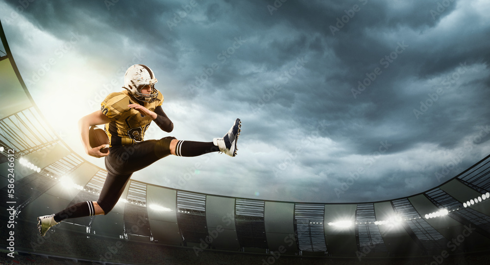 Motivated man, professional american football player in motion ...