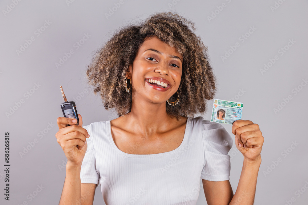beautiful Brazilian woman, black,.holding driver's license, driver's ...