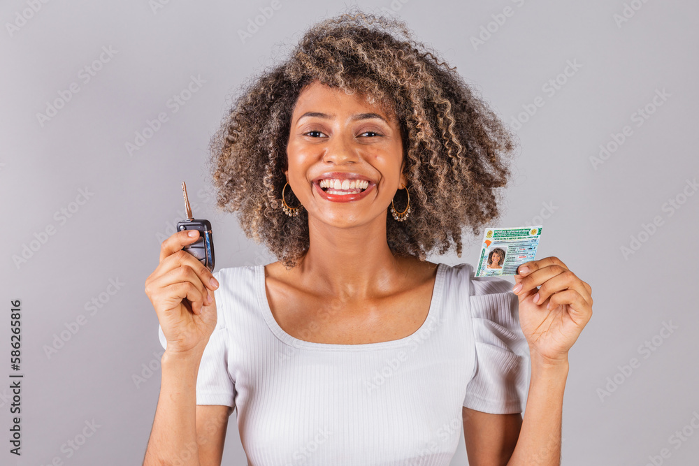 beautiful Brazilian woman, black,.holding driver's license, driver's ...