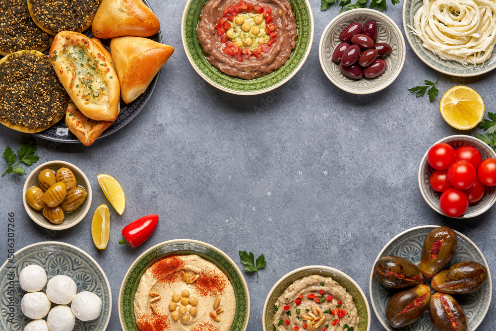 Foto de Middle eastern, arabic traditional breakfast with hummus, foul ...