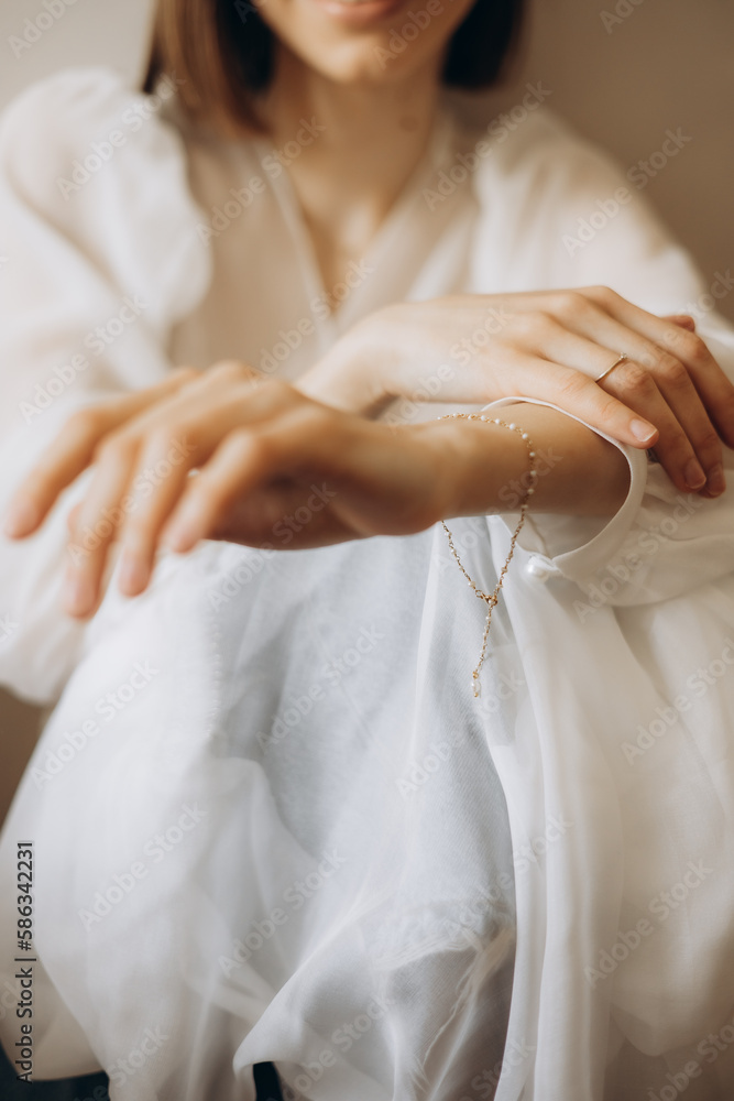 fragile hands of a young woman in a photo with a shallow depth of field ...
