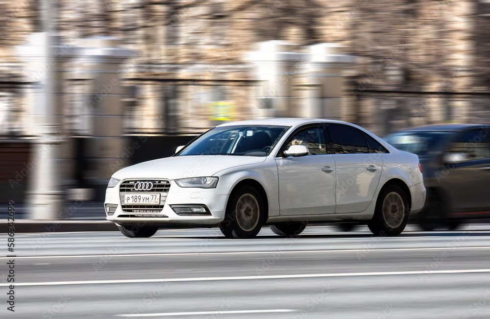 fast moving white car with motion blur effect. overspeed concept ...