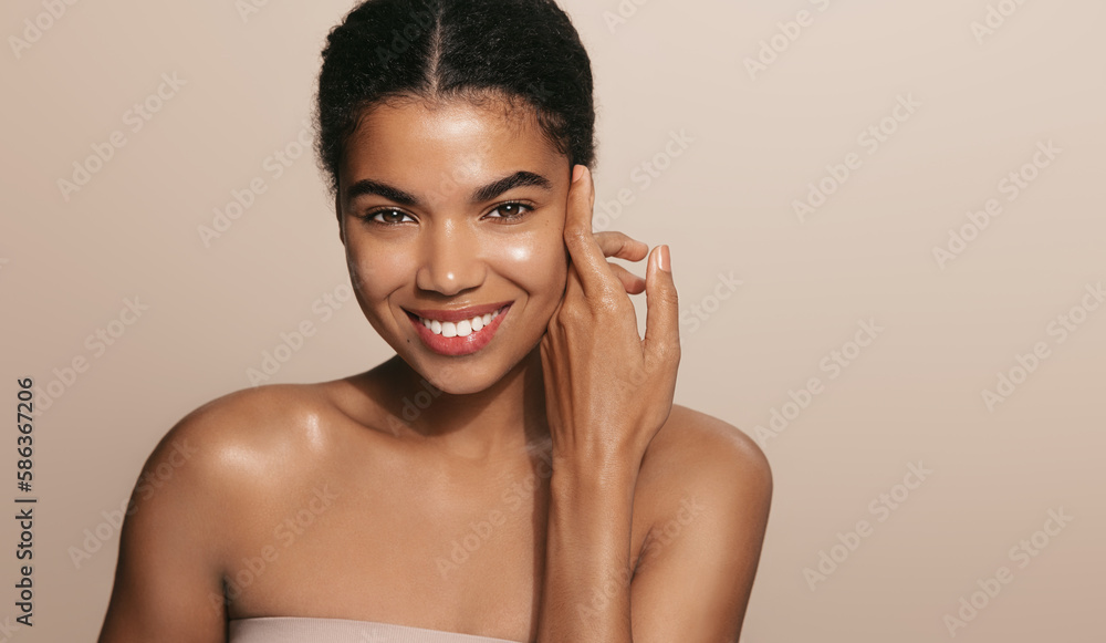 Skin care routine. Dark skinned woman with perfect glowing body, head ...