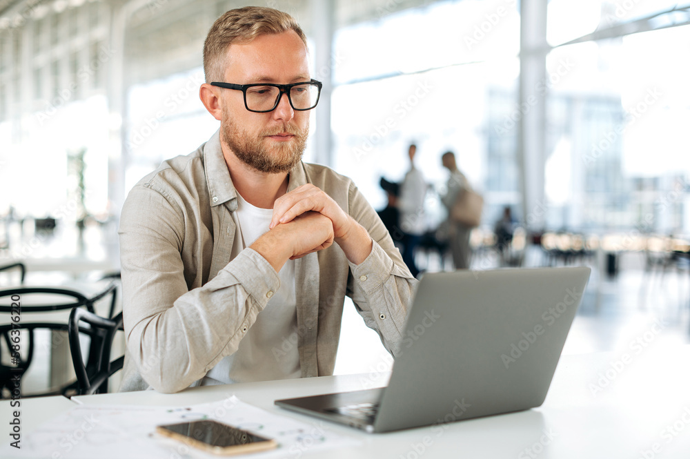 Thoughtful busy caucasian man with glasses, in casual wear, IT ... Thoughtful busy caucasian man with glasses, in casual wear, IT ...
