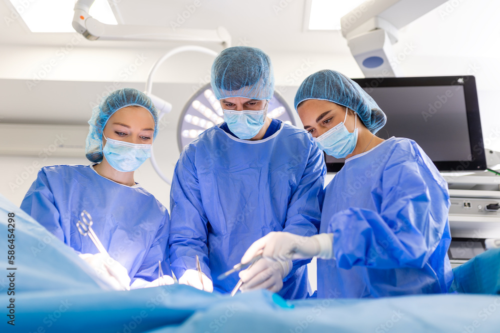 Doctor and assistant nurse operating for help patient from dangerous ...