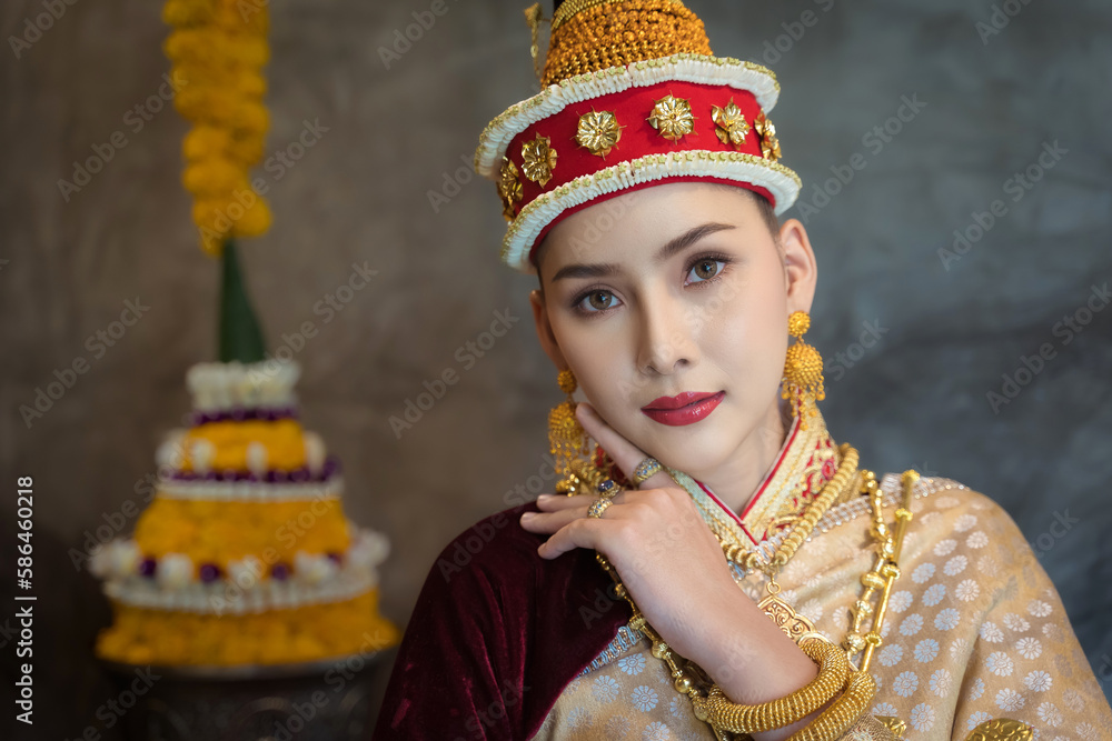 Pretty young Asian woman dressed elegantly in dress Luang Prabang Laos ...
