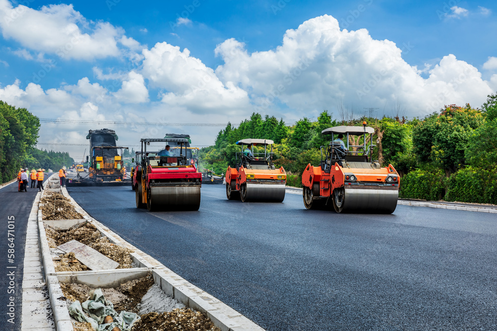 Construction site is laying new asphalt pavement, road construction ...