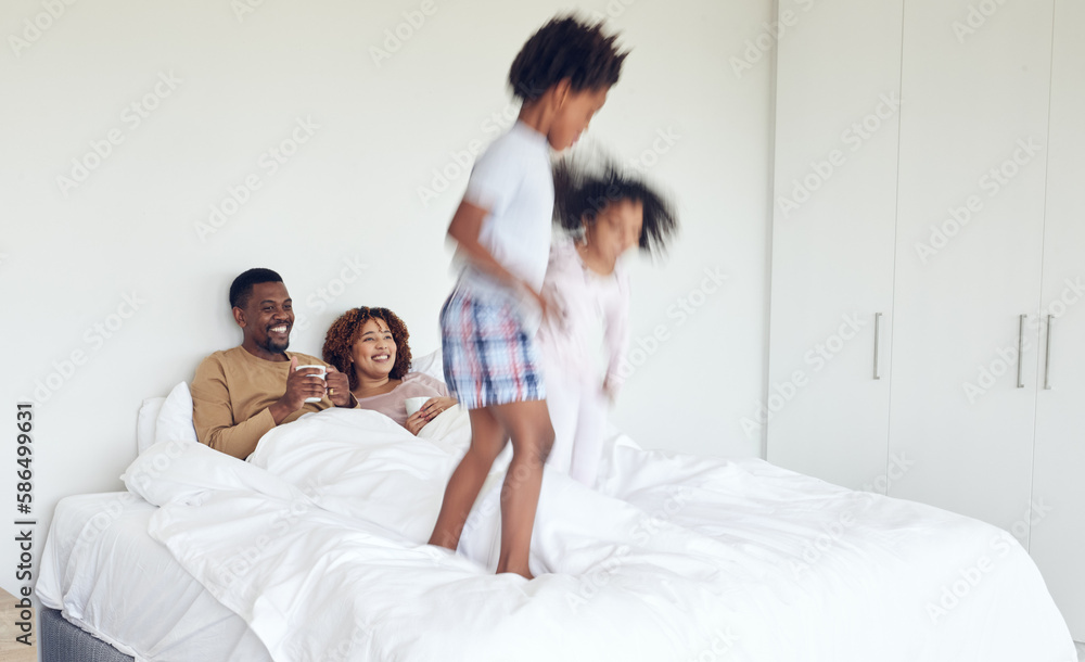 Foto de Love, parents in bed and children jumping, quality time and happiness with bonding, home ...