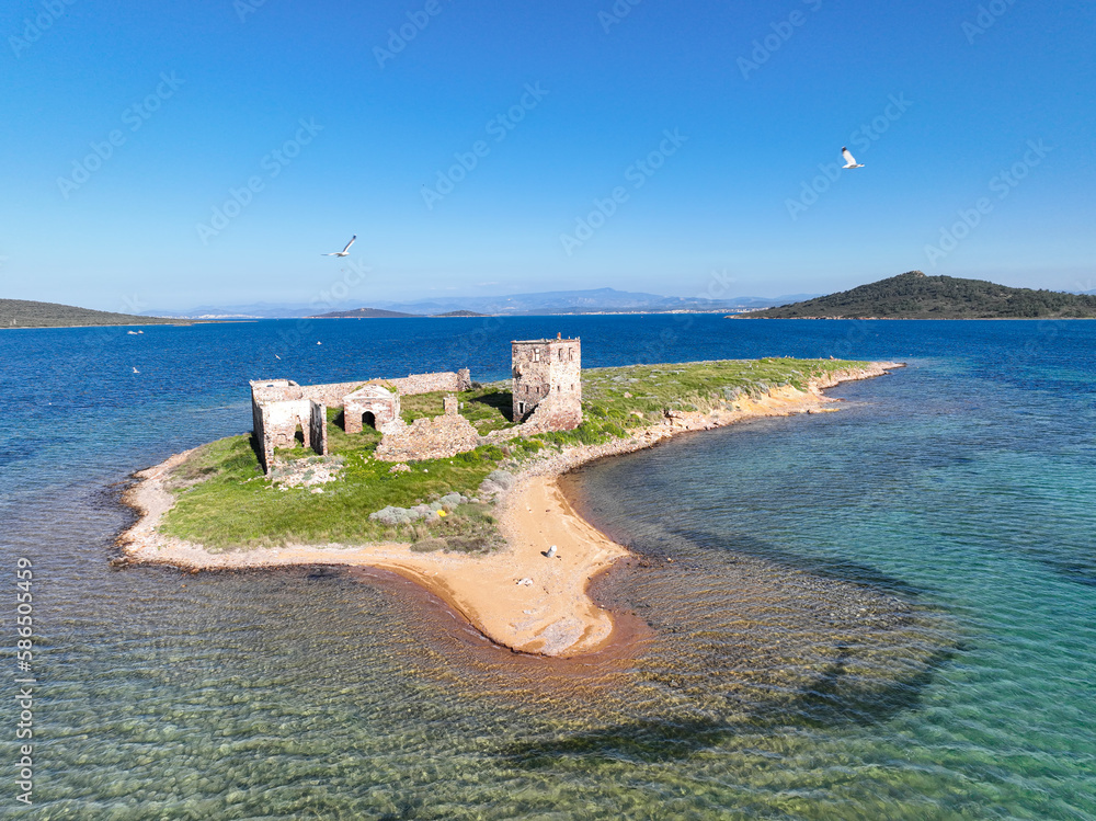 Historic ancient monastery on an island around the Patrica beach ...