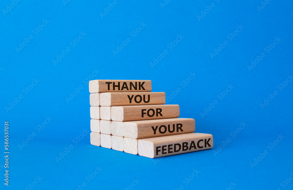 Feedback symbol. Wooden blocks with words Thank you for your Feedback ...