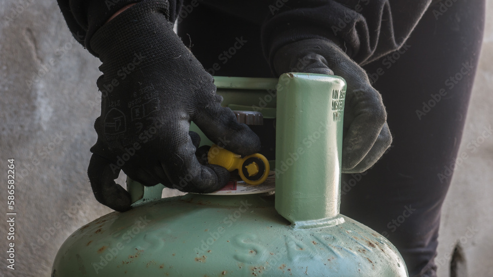 LPG cylinder connection with pressure regulator. close-up of a ...