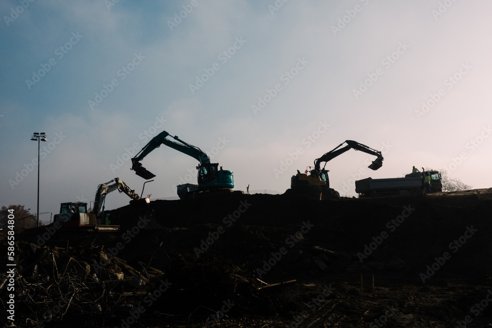 Excavators mining ground Stock Photo | Adobe Stock