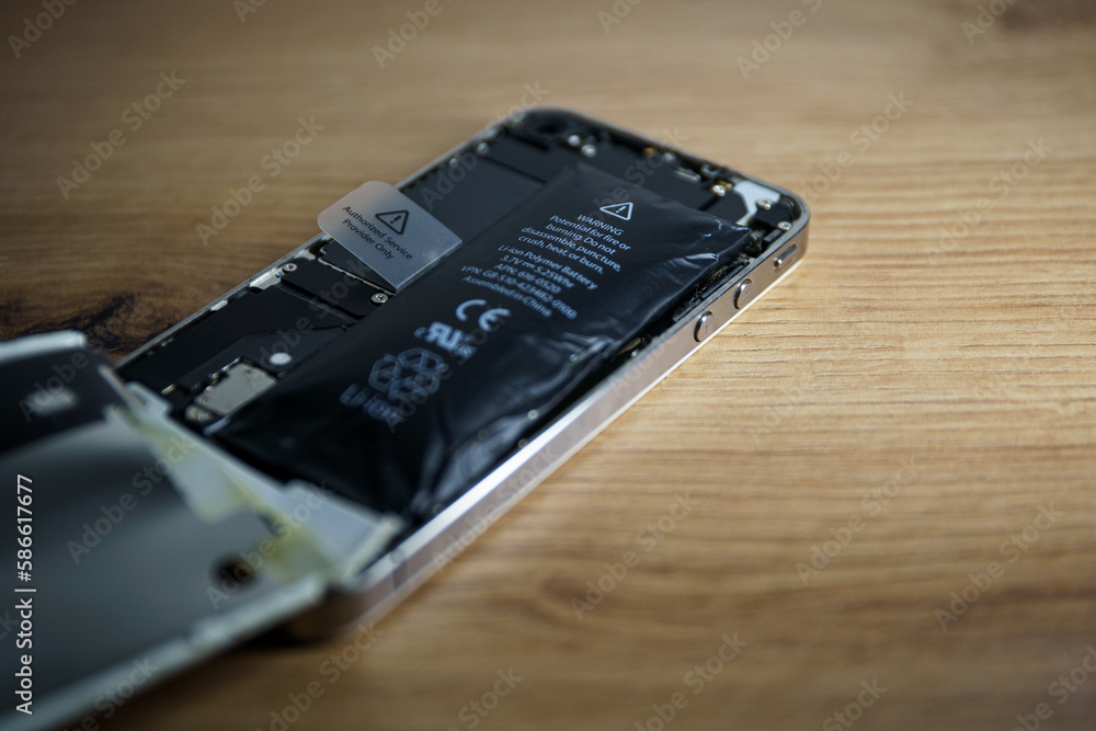 Iphone with exploded Lithium-ion battery. Li-ion swollen battery Stock ...
