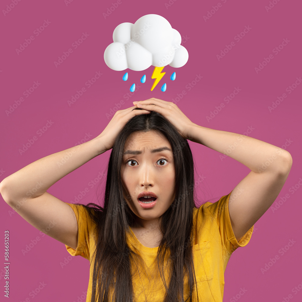 Foto de Sad despaired asian lady suffering from stress holds hands with ...