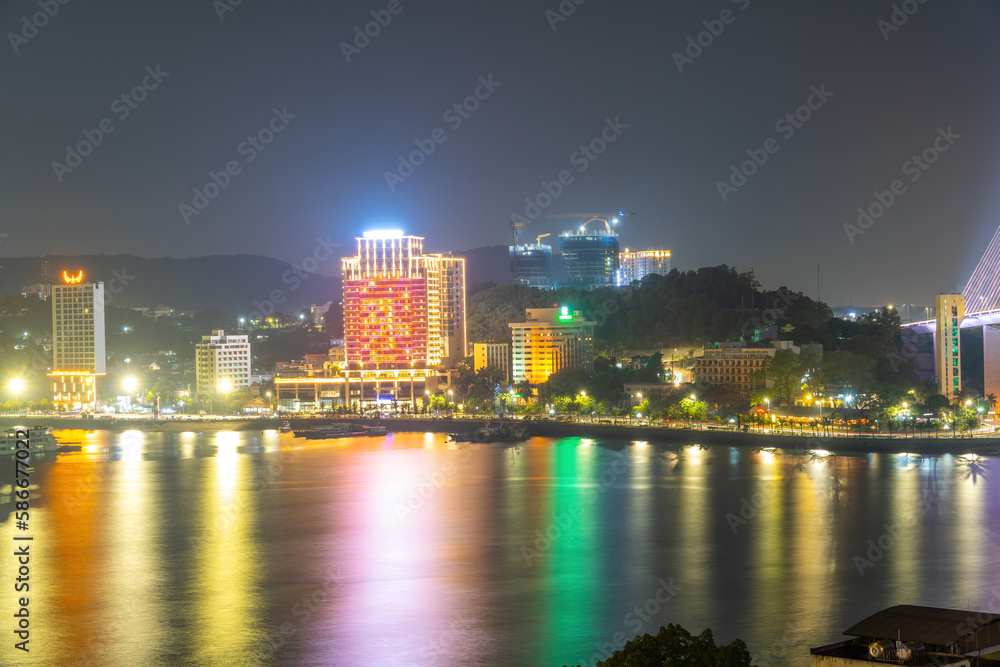Colorful night view of Bai Chay Bridge, connecting two parts of Ha Long ...