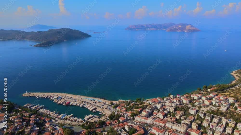 Drone video capturing Kaş center, marina, and distant Meis Island as it ...