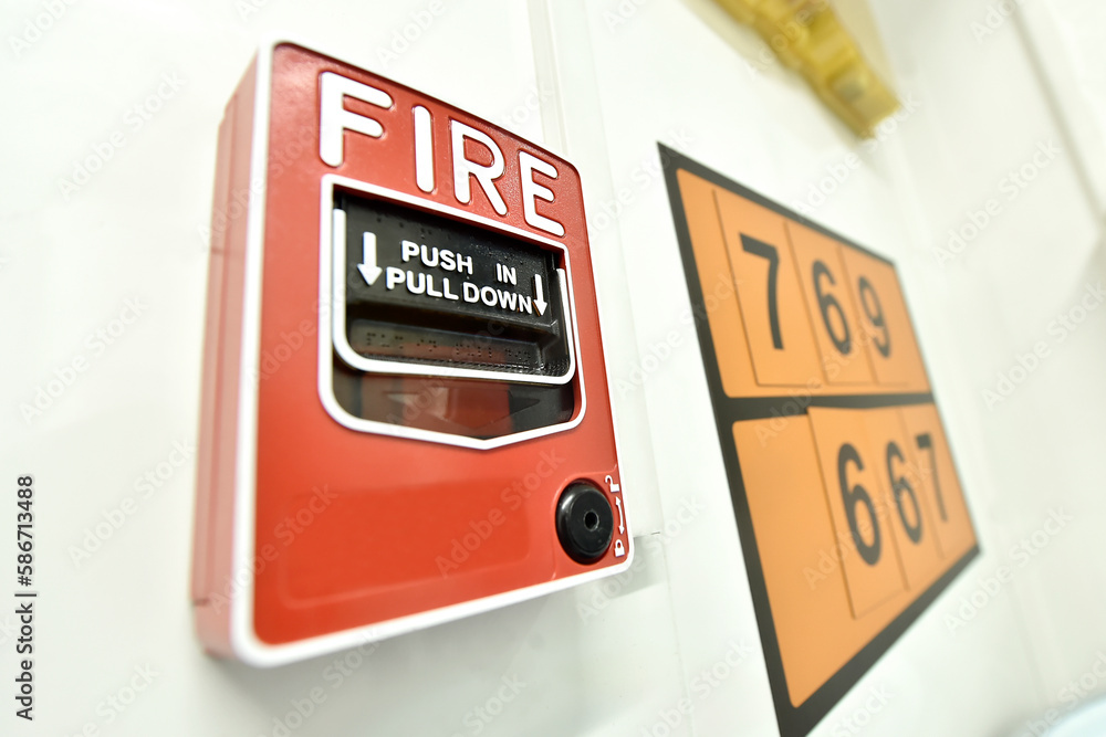 Red fire alarm button in the building. Push in pull down. Stock Photo ...