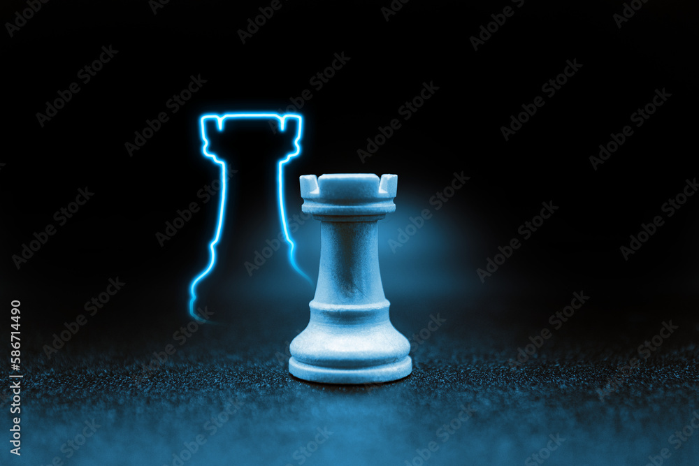 blue rook chess piece with led in the shape of the rook piece. close up ...