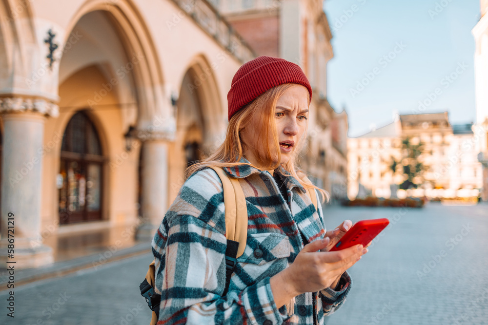 Upset sad angry woman in style clothes with backpack has received bad ...