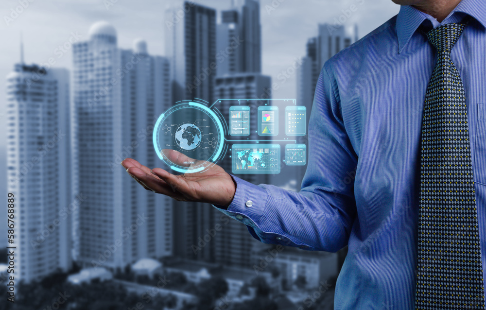 Businessman holding tablet and showing a growing virtual hologram of ...