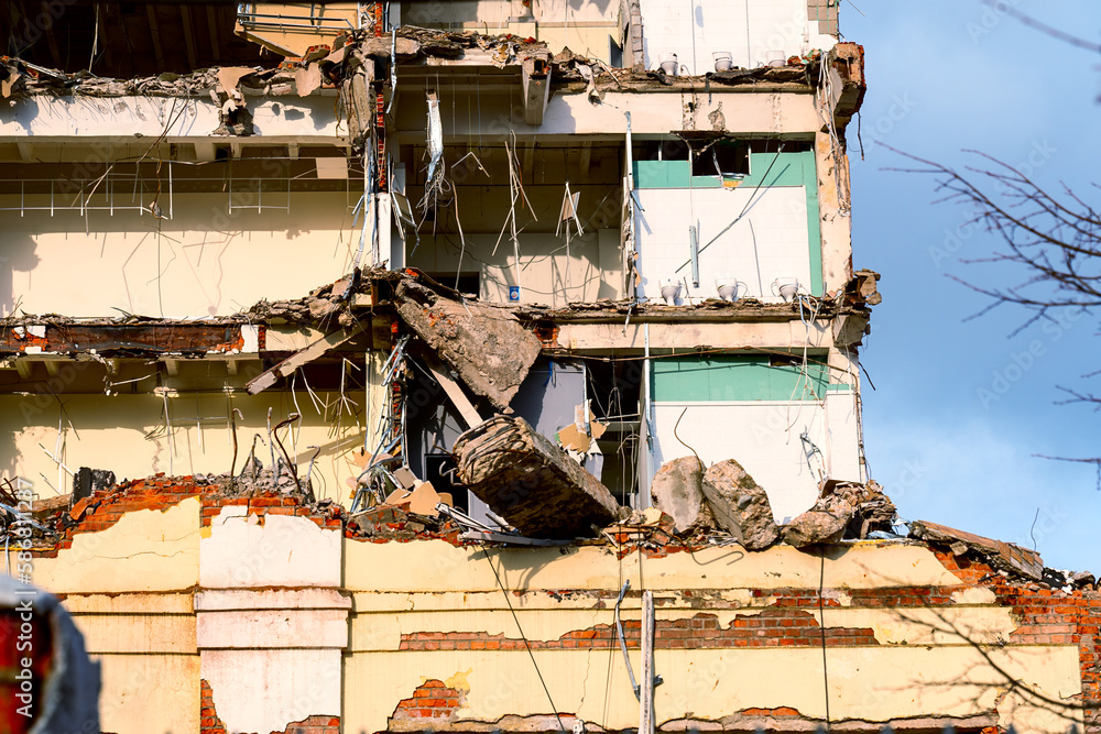 dismantled old building. Half demolished house, dismantling of the old ...