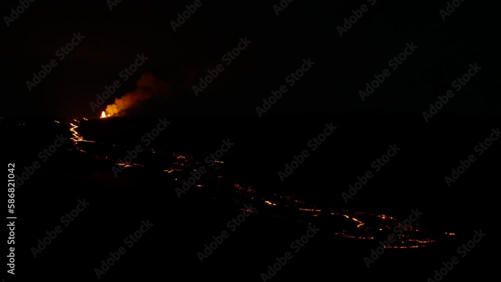 Red orange yellow glowing hot lava and magma erupting out of volcano at ...