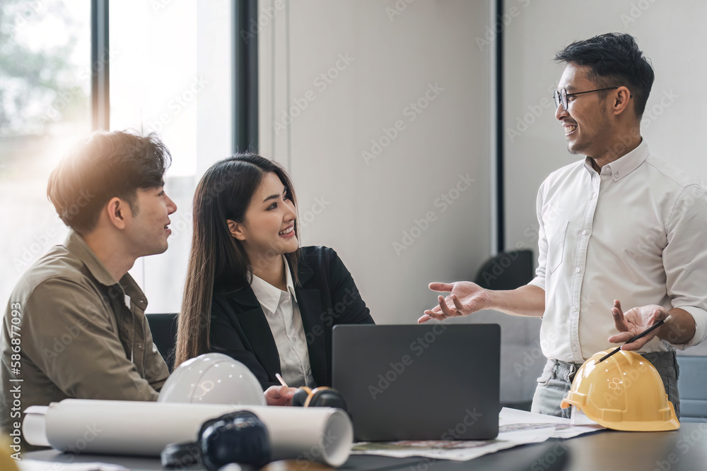 Foto de Civil engineer teams meeting working together wear worker ...