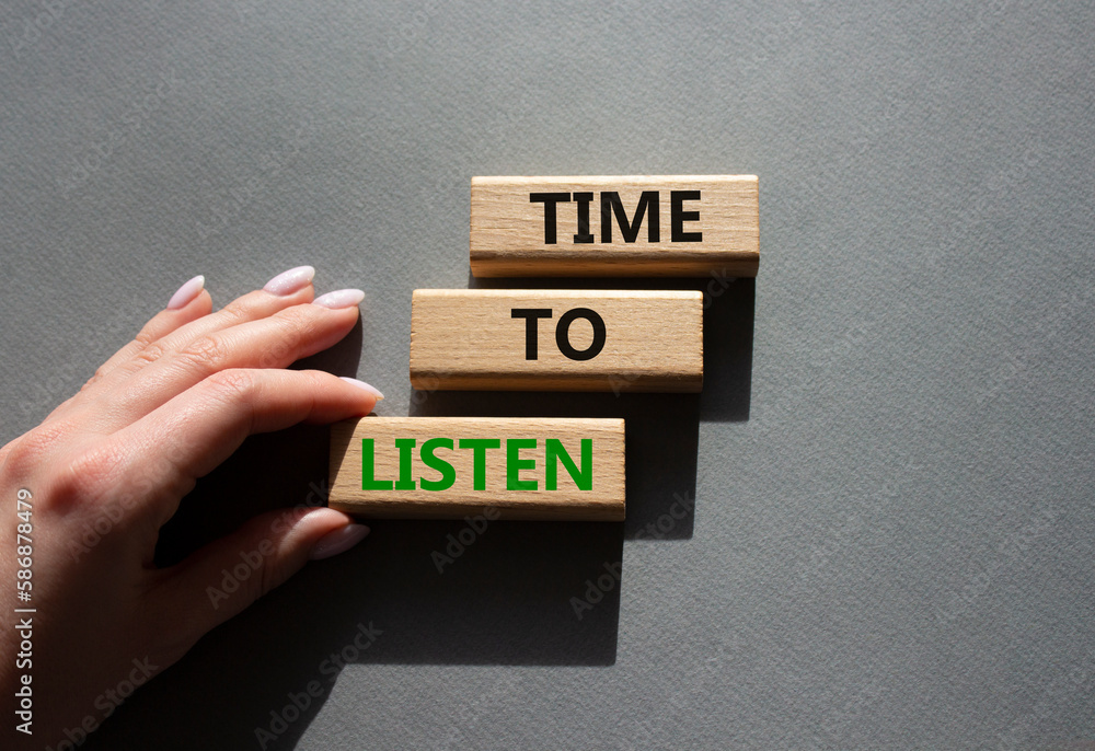 Time to listen symbol. Wooden blocks with words Time to listen ...