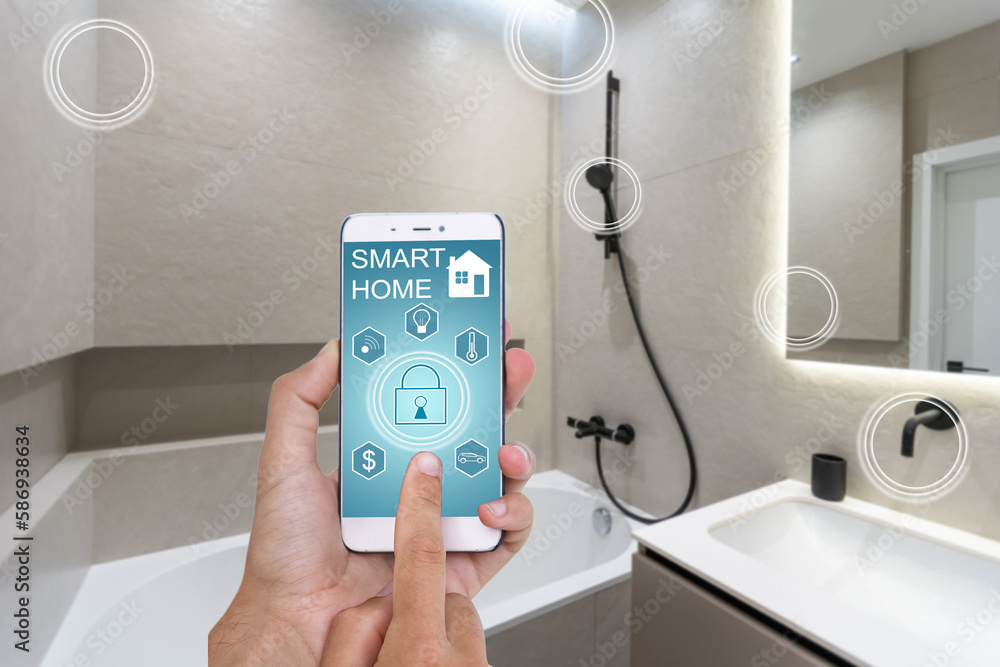 Female hands holding phone with app smart home screen in room house ...