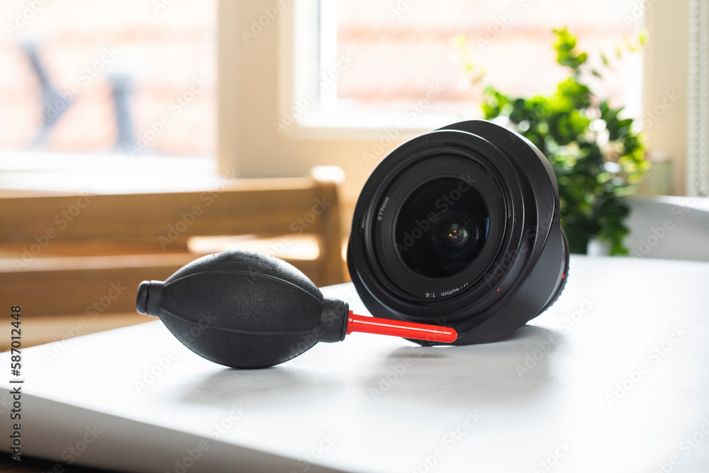 Lens on desk with cleaning tools for DSLR and Mirrorless cameras ...