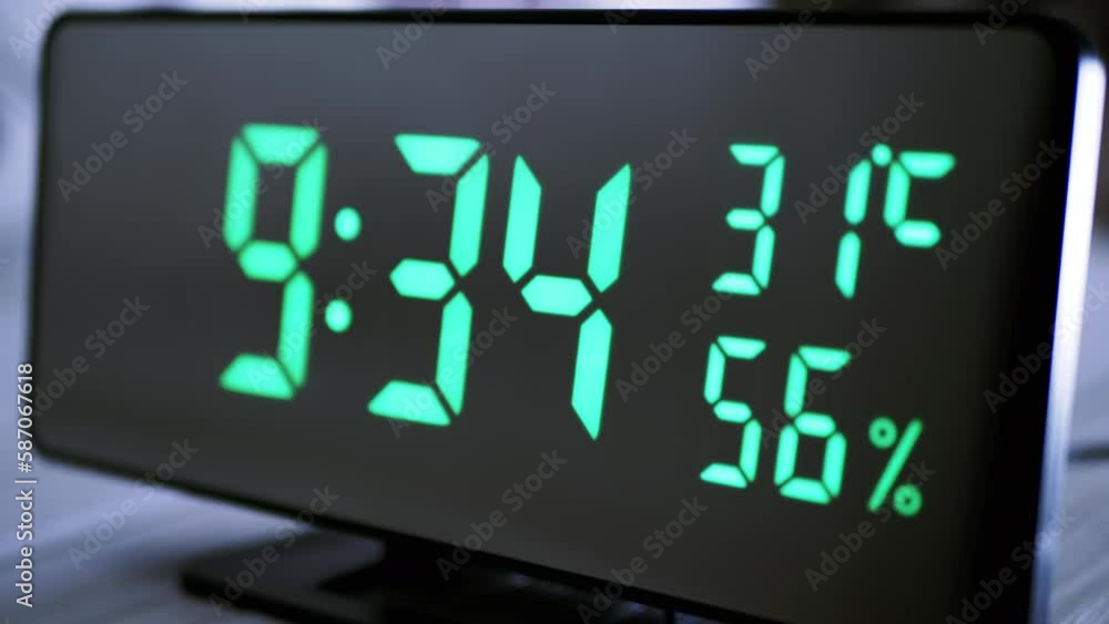 Digital Clock Showing Time on Green Display 9:34 AM, Temperature, Air ...