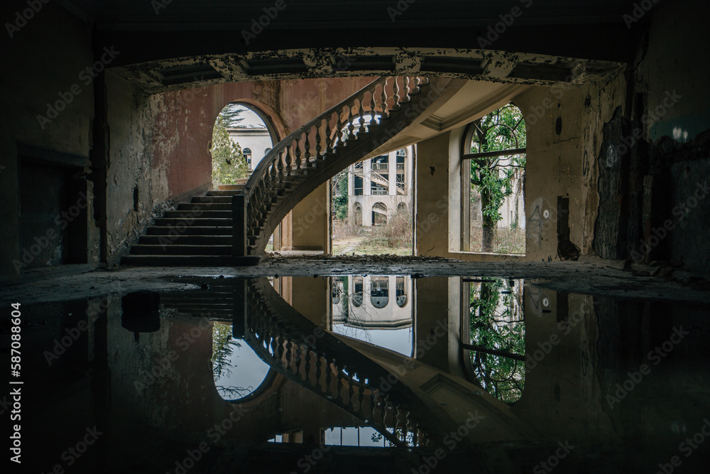 Photo & Art Print Old flooded abandoned mansion with spiral stair ...