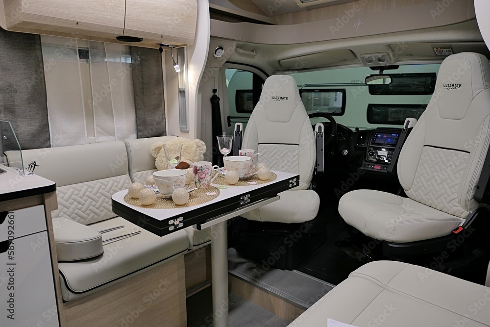 Front part of interior of modern luxurious french camper van Rapido ...