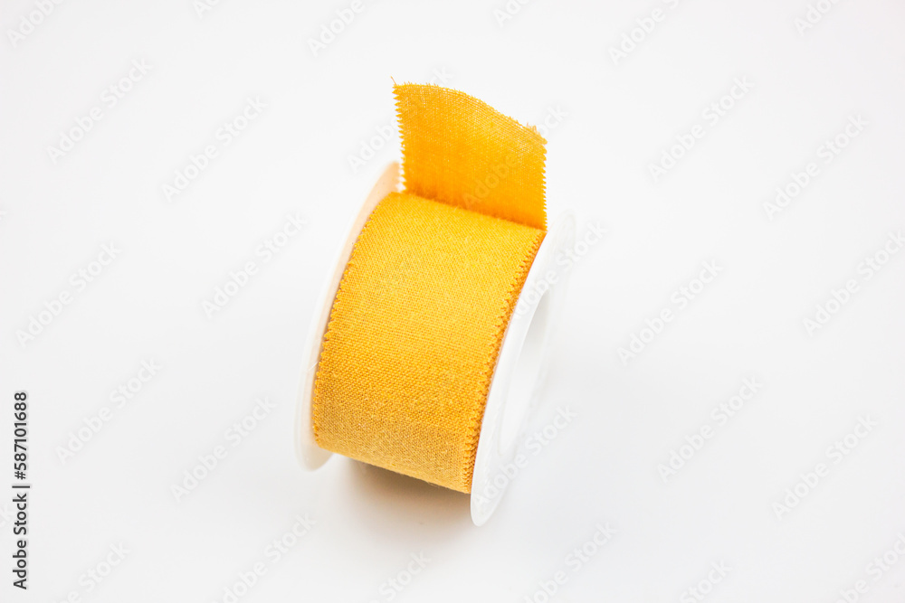 Plaster medical for wounds.Reel with a plaster on a white background ...