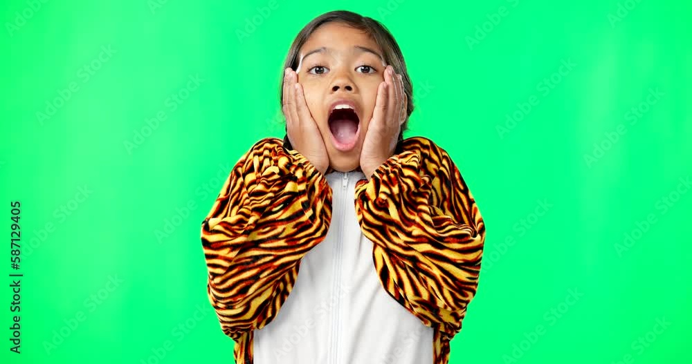 Girl child, shock face and green screen studio with tiger pyjamas ...