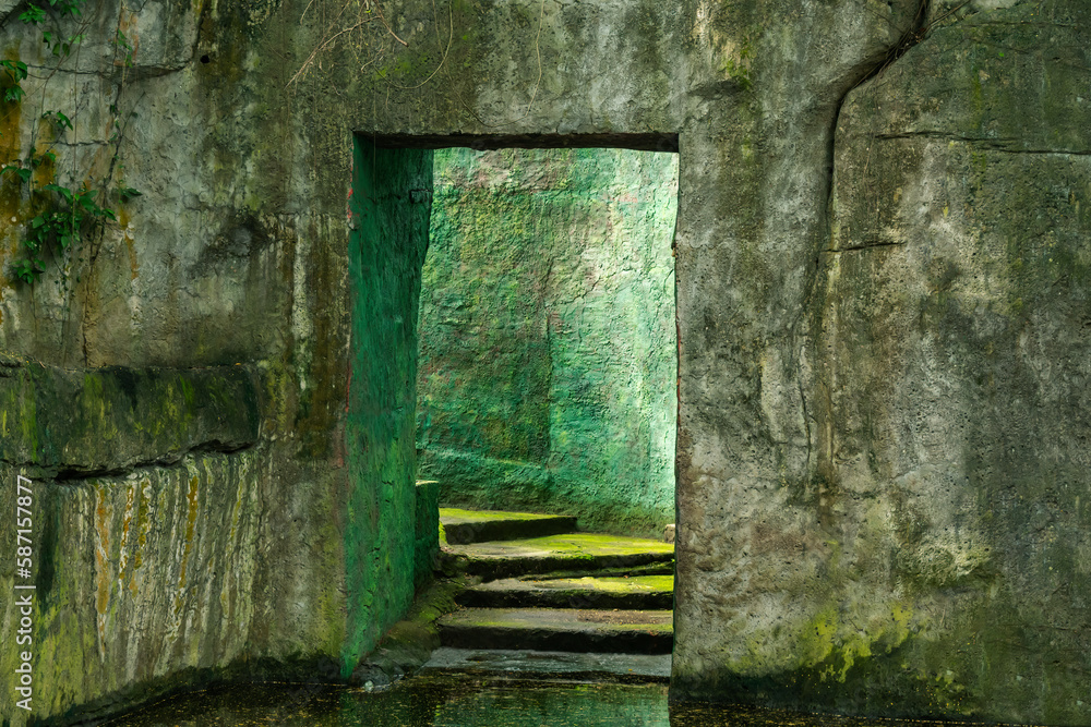 Ancient stone portal with a staircase illuminated by a mysterious light ...