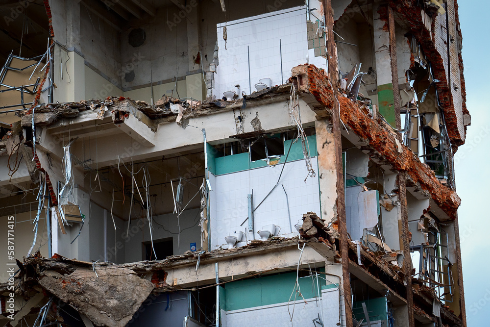 dismantled old building. Half demolished house, dismantling of the old ...