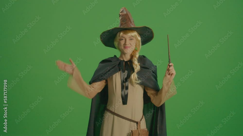 Green Screen. Portrait of a Girl Sorceress Makes Wishes With a Magic ...