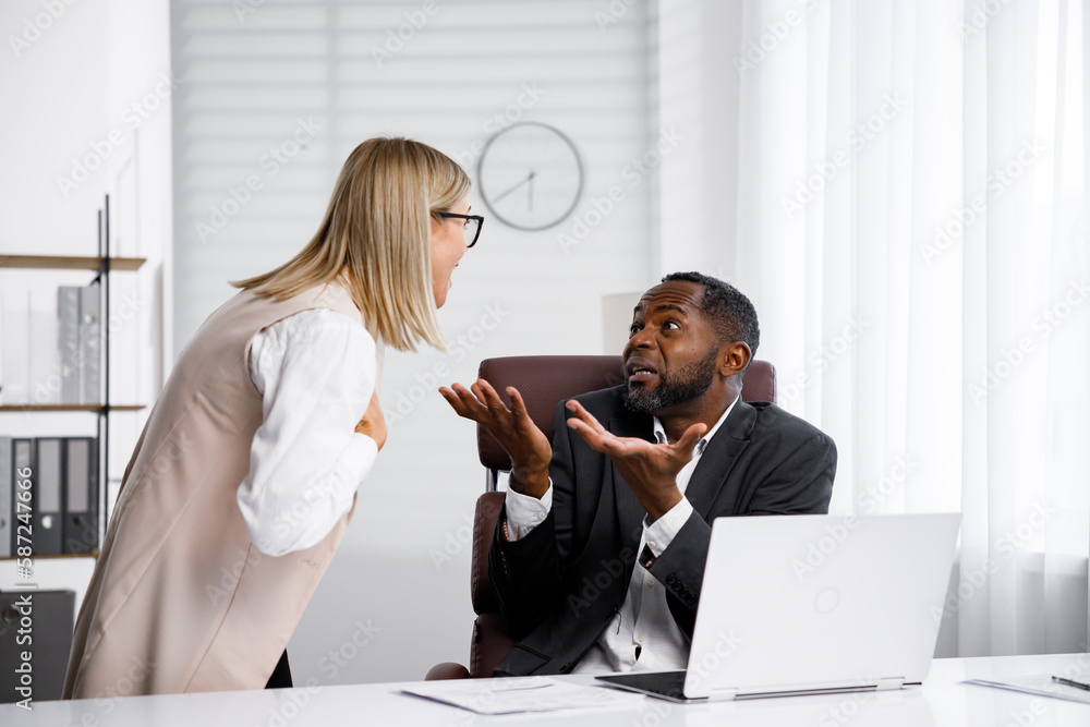 Photo & Art Print Angry female boss scolding African American office ...