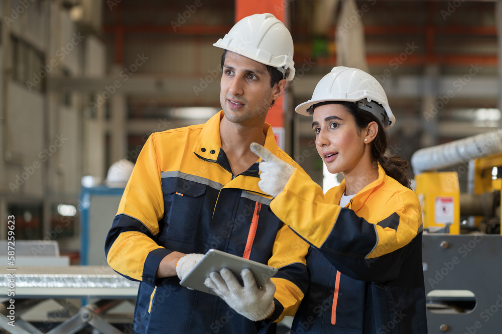 Manufacturing industrial concept. Male and female engineer workers ...