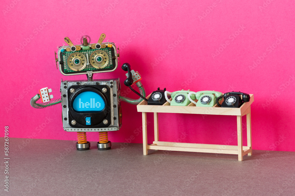 Robot bot operator holds handset rotary telephone. hot line phone ...