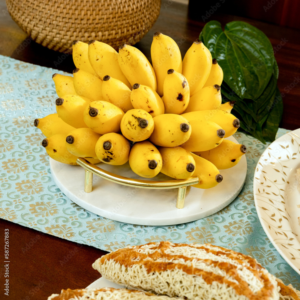 Bananas in Traditional Foods Table Stock Photo | Adobe Stock