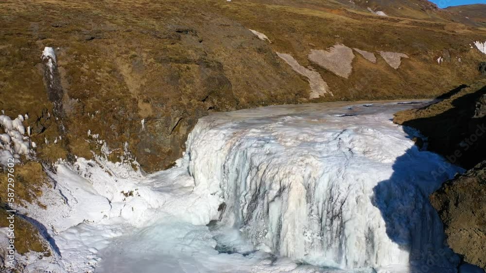 Waterfalls and ice in winter. Famous waterfall landscape in Iceland ...