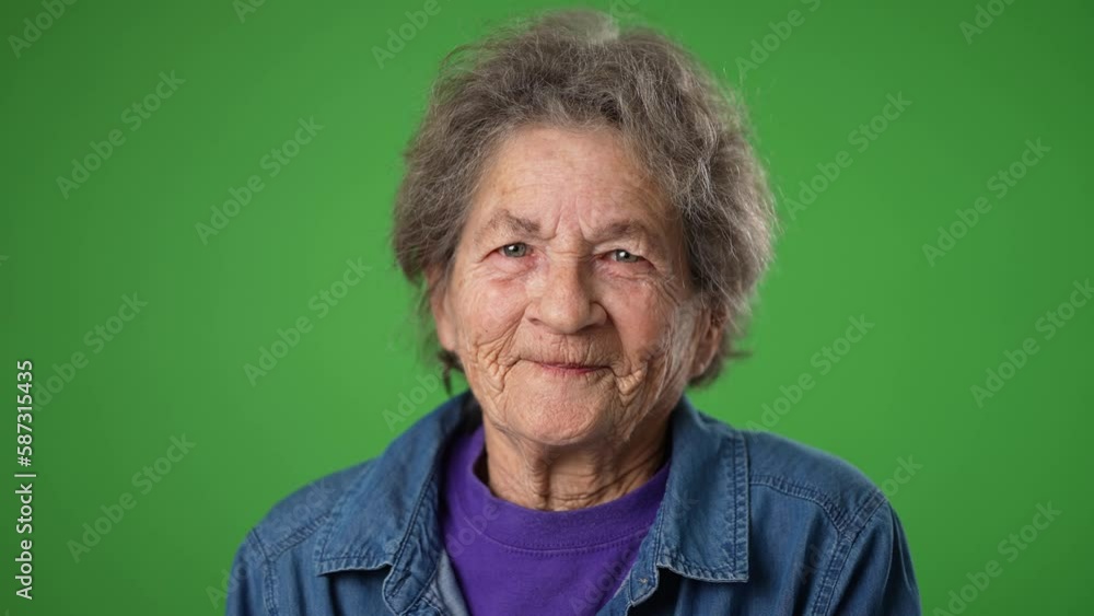 Closeup slow motion portrait of toothless happy smiling elderly senior ...