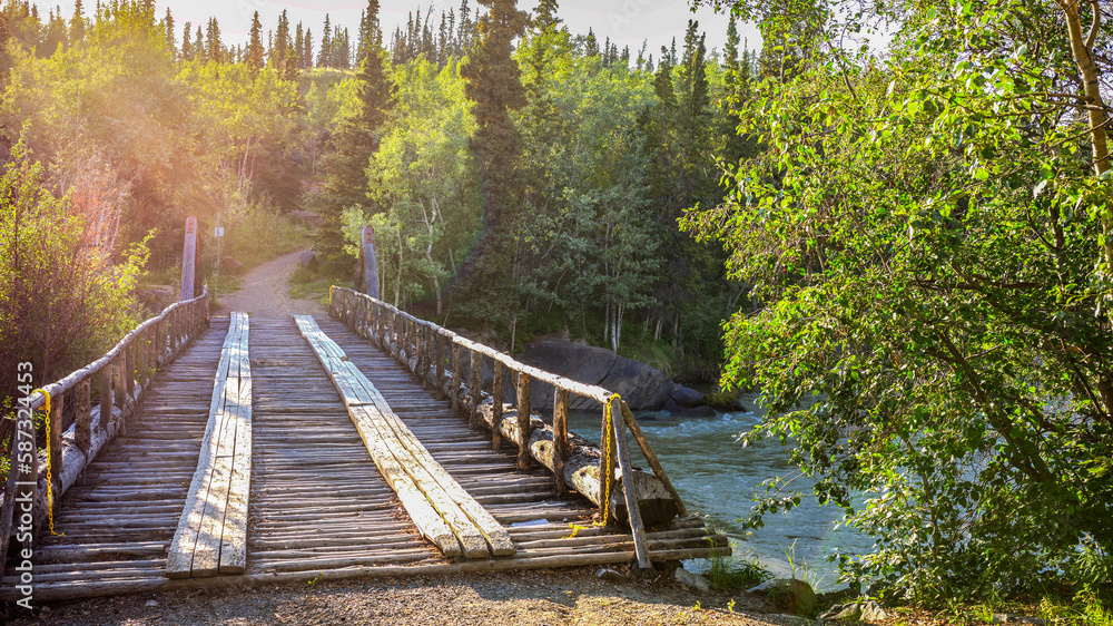 One of the old wooden bridges on the Old Alaska Highway built by the ...