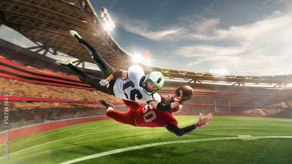 Professional american football players in motion and action with ball ...