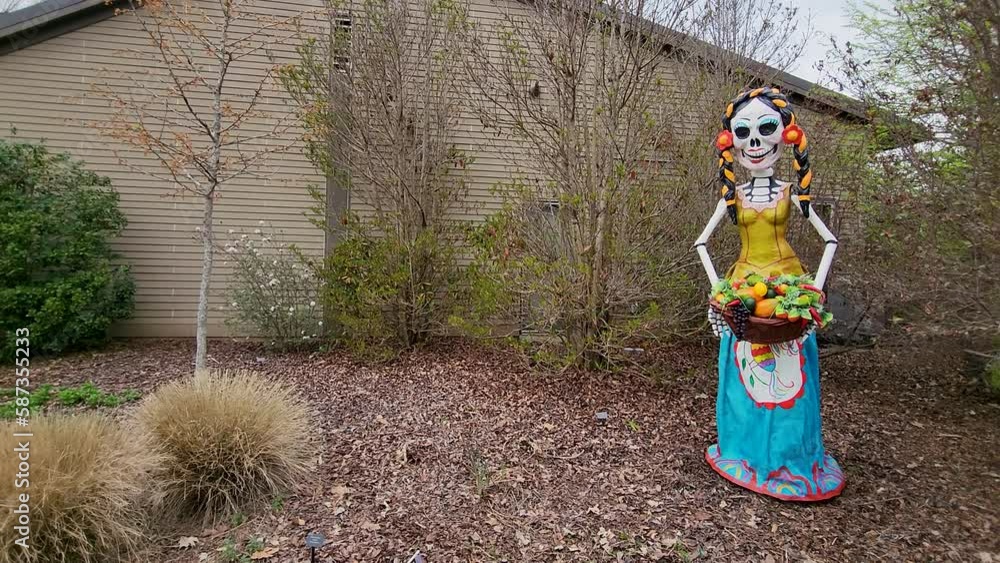 footage of a colorful skeleton sculpture of La Catrina one of the most ...