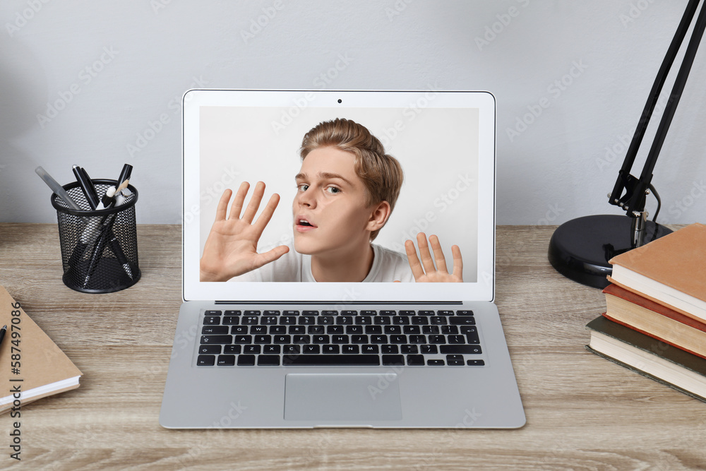 Internet addiction. Teenager trapped in laptop. Boy stuck to monitor ...
